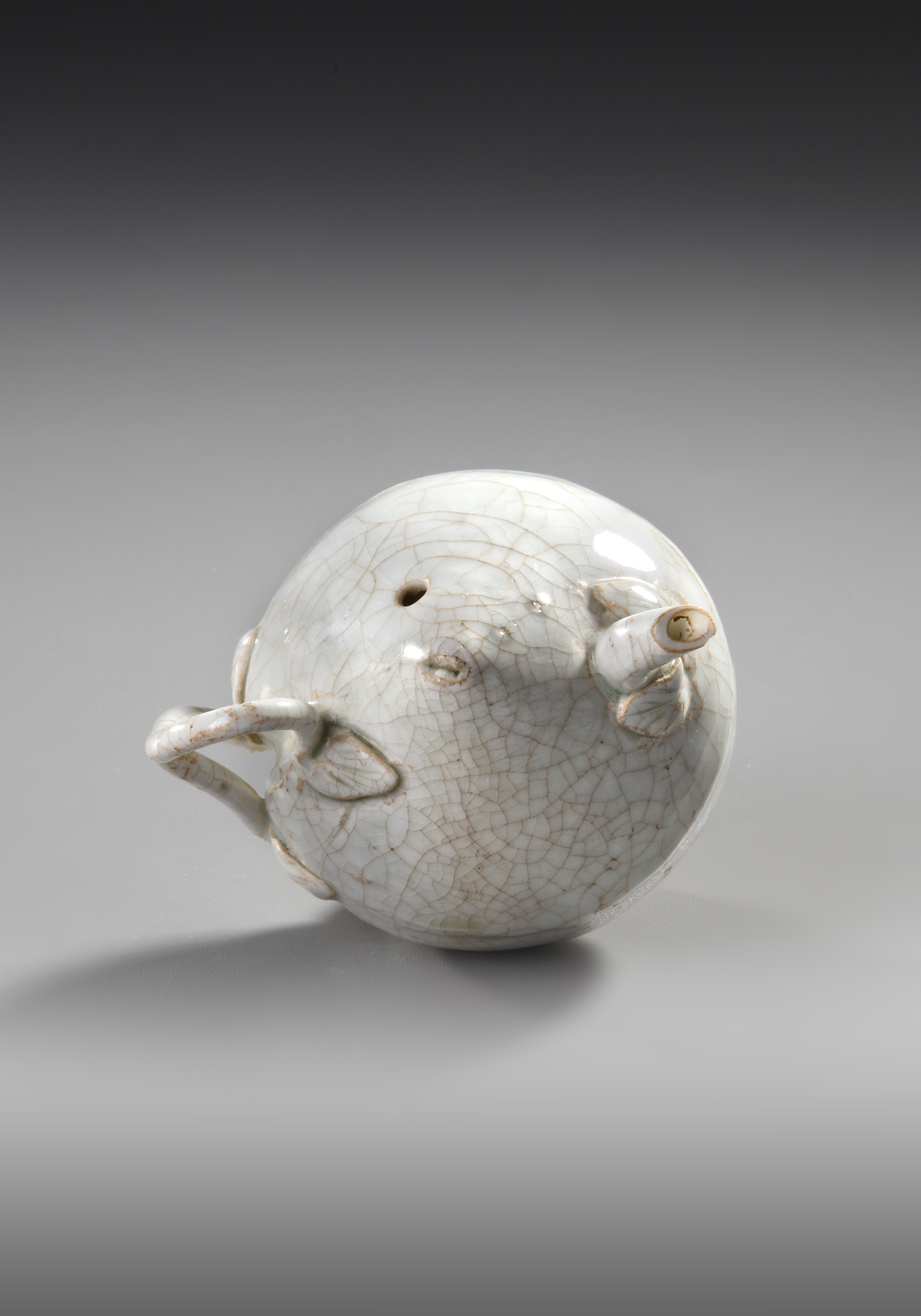 A CHINESE QINGBAI PEACH-FORM WATER DROPPER, SONG DYNASTY (960-1279)