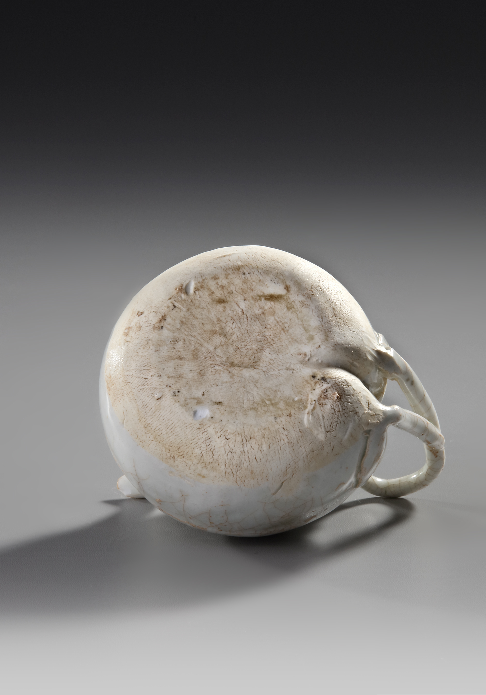A CHINESE QINGBAI PEACH-FORM WATER DROPPER, SONG DYNASTY (960-1279)