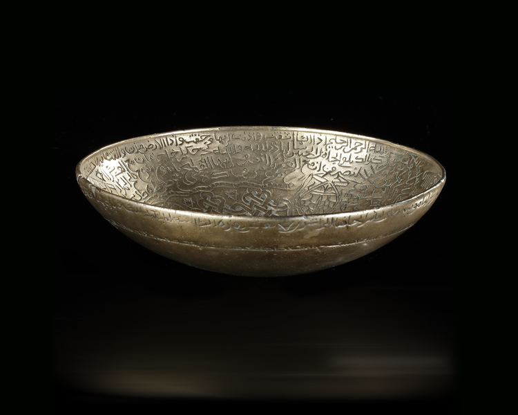 A GILT BRONZE MAGIC BOWL, 13TH-14TH CENTURY