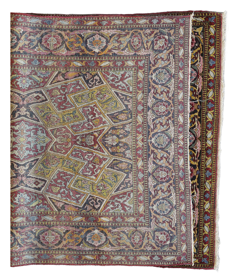 AN AHMAD ISFAHAN RUG WITH UNUSUAL DESIGN