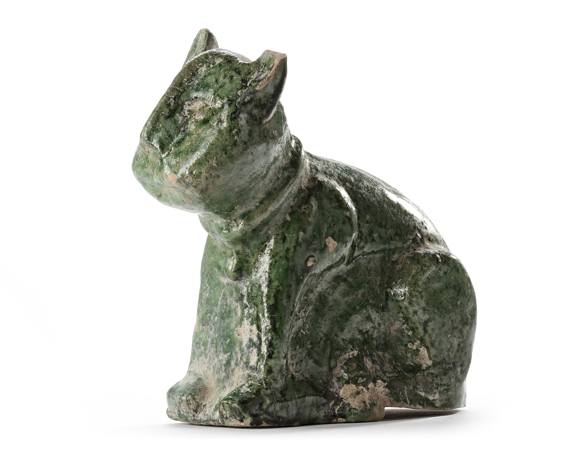 AN UMAYYAD POTTERY SCULPTURE OF A FELINE, 8TH CENTURY