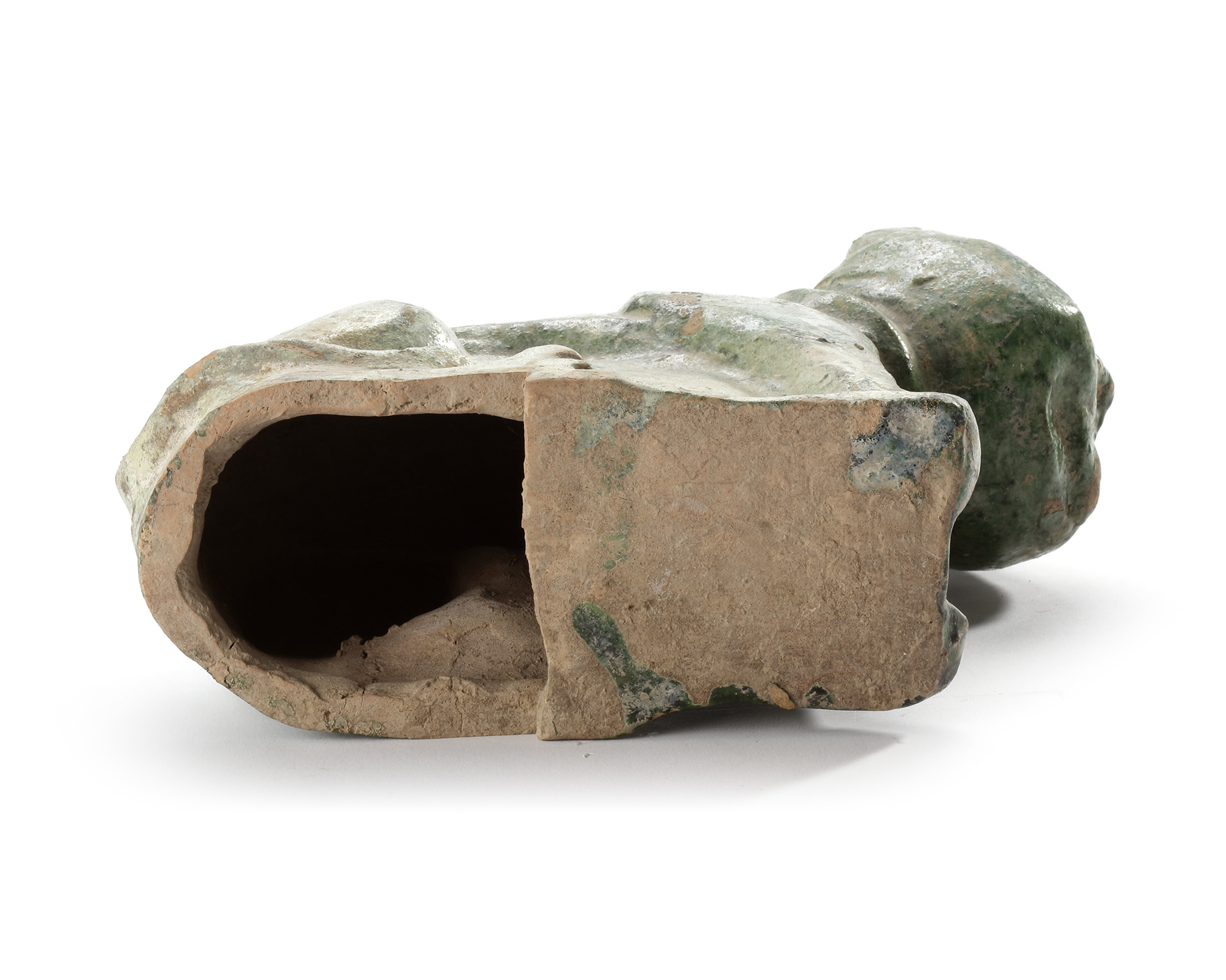 AN UMAYYAD POTTERY SCULPTURE OF A FELINE, 8TH CENTURY