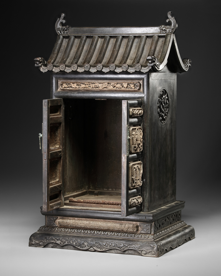 A CHINESE CARVED ZITAN ALTAR CABINET, QING DYNASTY (1644-1911)