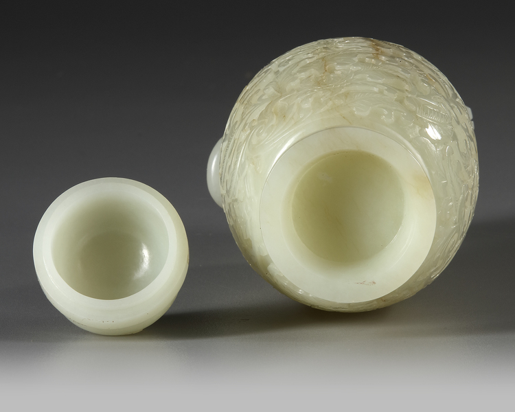 A CHINESE CARVED JADE VASE AND COVER, QING DYNASTY (1644-1911)