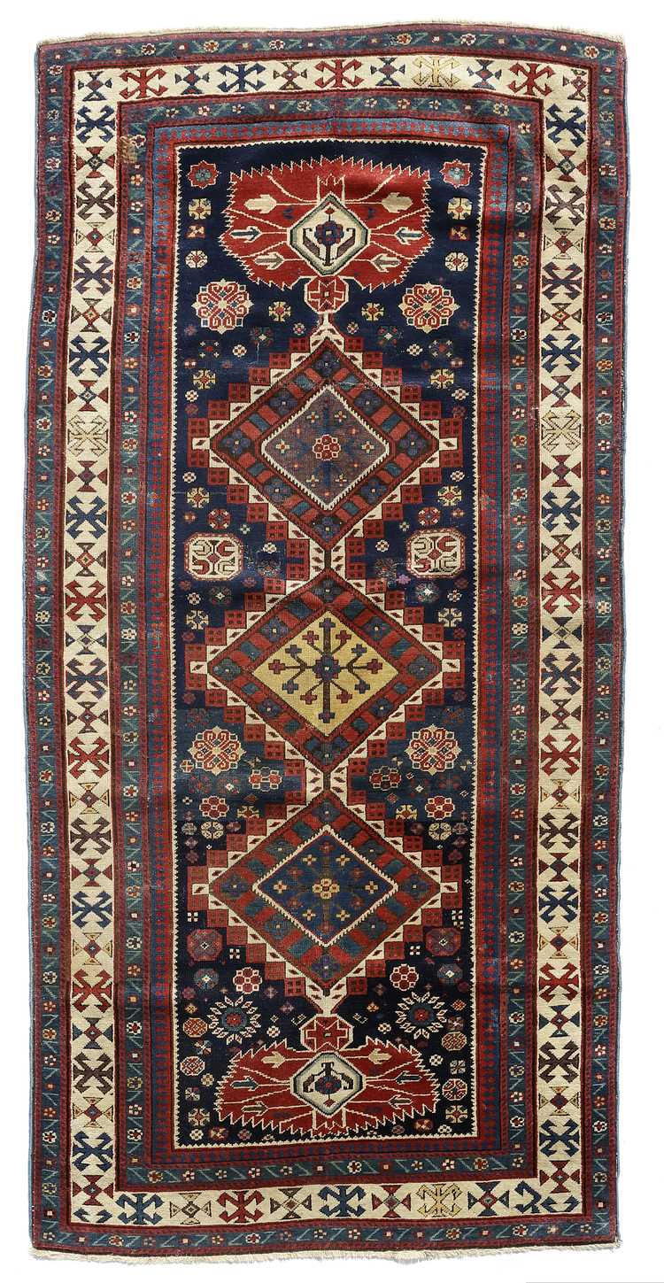 A KAZAK RUG, CAUCASUS, MID 19TH CENTURY
