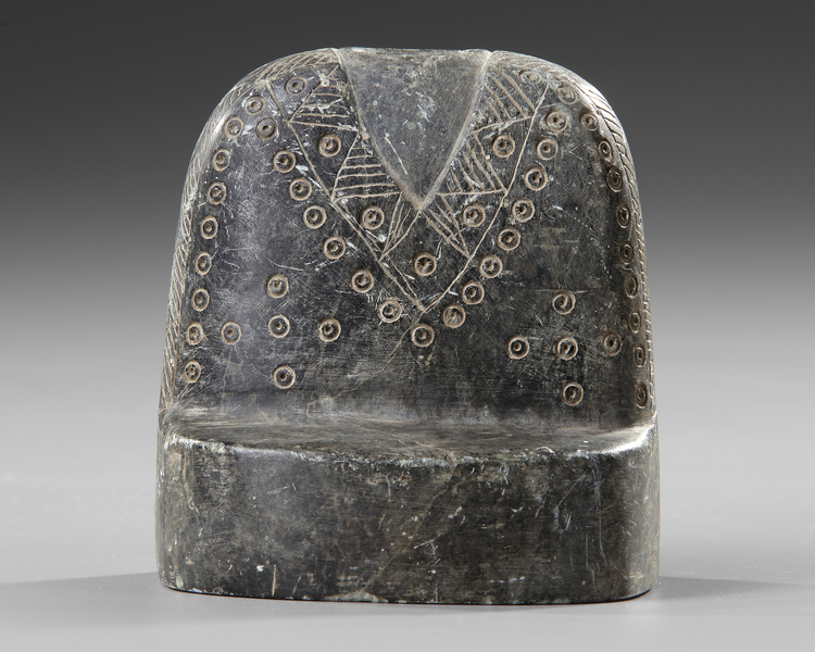 A GREEN ALABASTER PLANK IDOL, 2ND MILLENNIUM BC