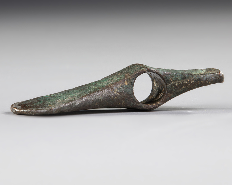 A BRONZE SOCKET AXE, LATE BRONZE AGE, 1300 - 800 BC