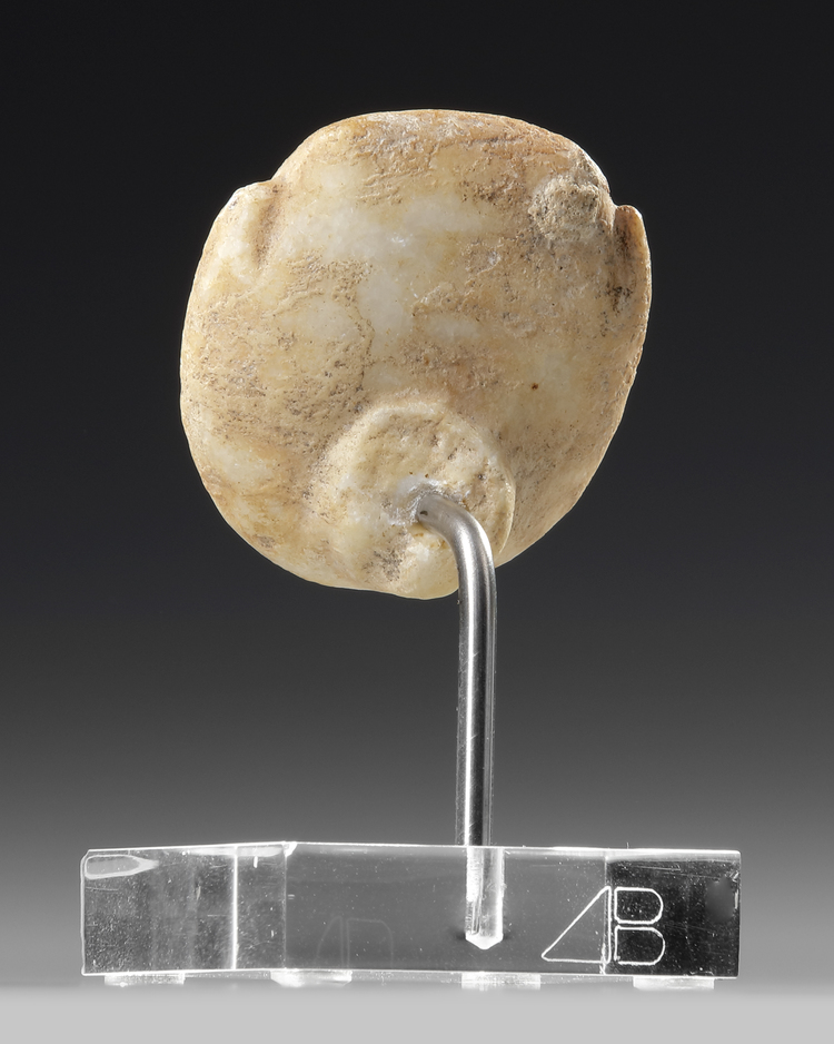 A HEAD OF A MARBLE IDOL, KILIYA TYPE, WESTERN ASIATIC, CIRCA 2700-2400/ ...