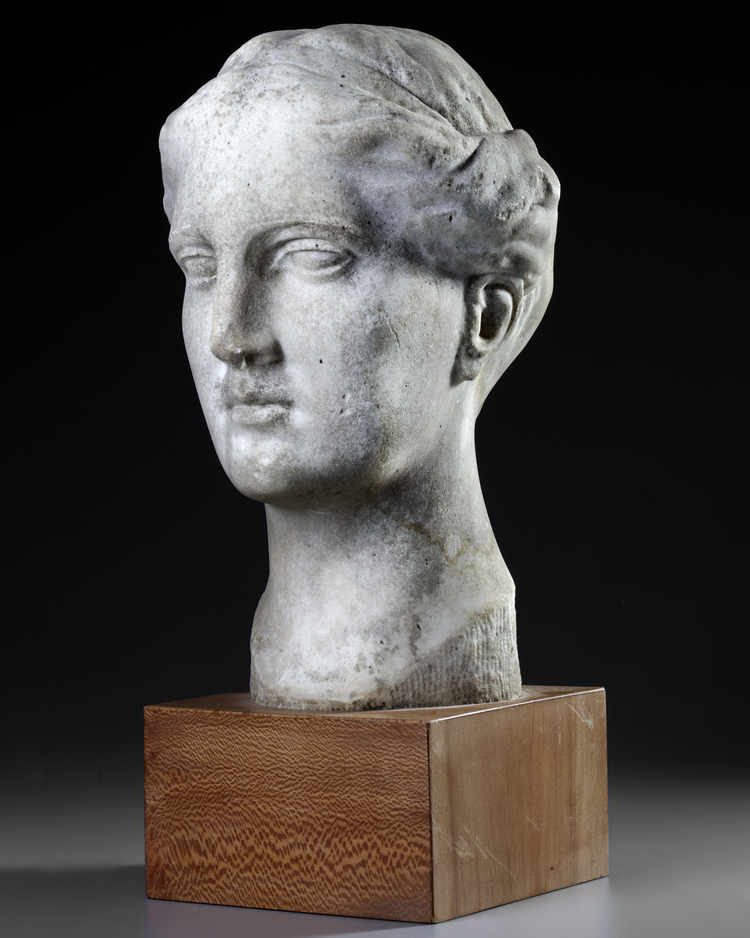 A MARBLE FEMALE HEAD, 17TH-18TH CENTURY
