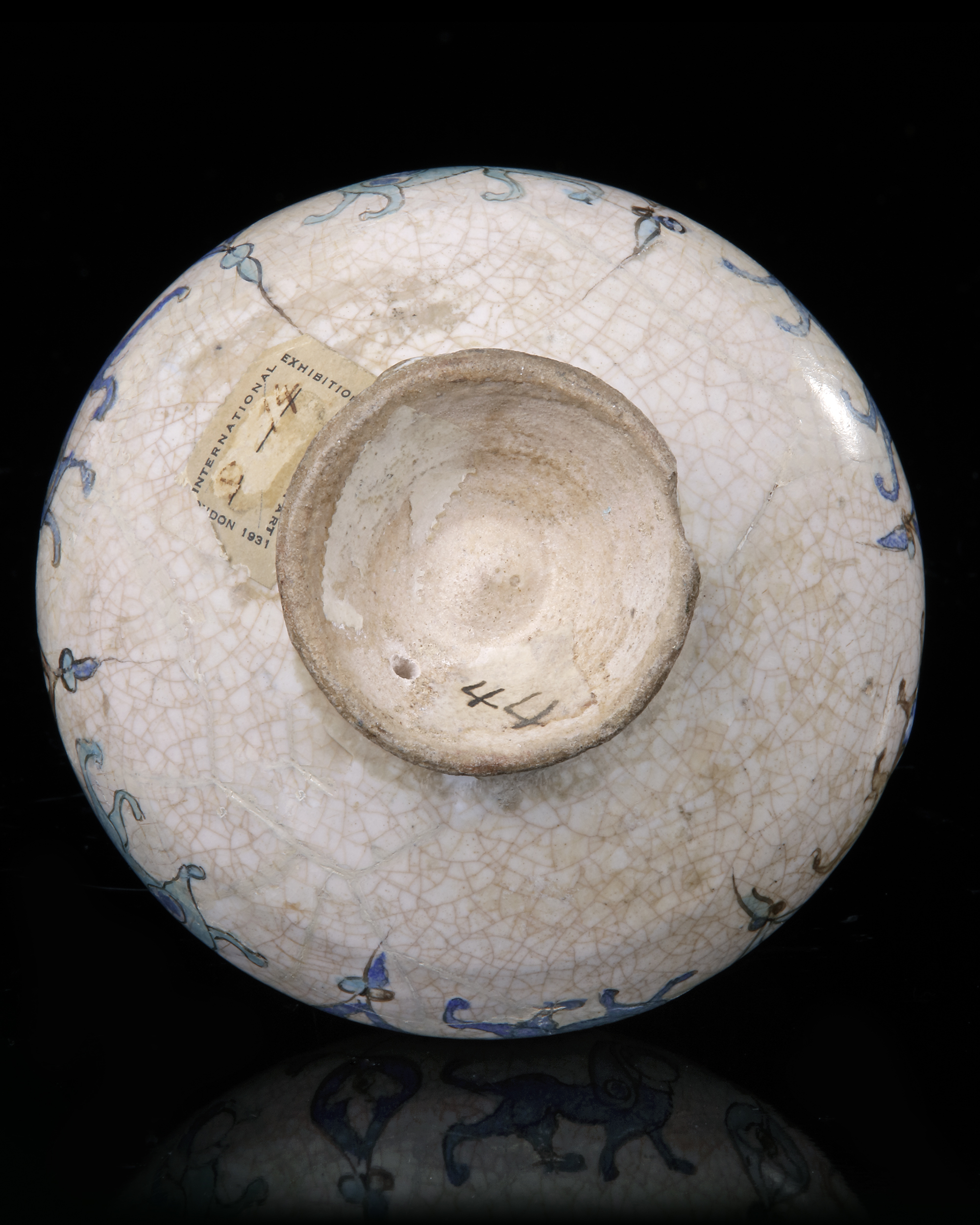 * A MINA'I POTTERY BOTTLE VASE, CENTRAL PERSIA, CIRCA 1200