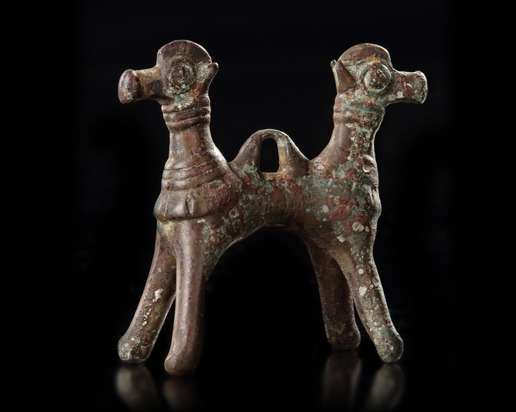 A BRONZE DOUBLE HEADED MYTHOLOGICAL ANIMAL, LURISTAN PERIOD, 1ST ...
