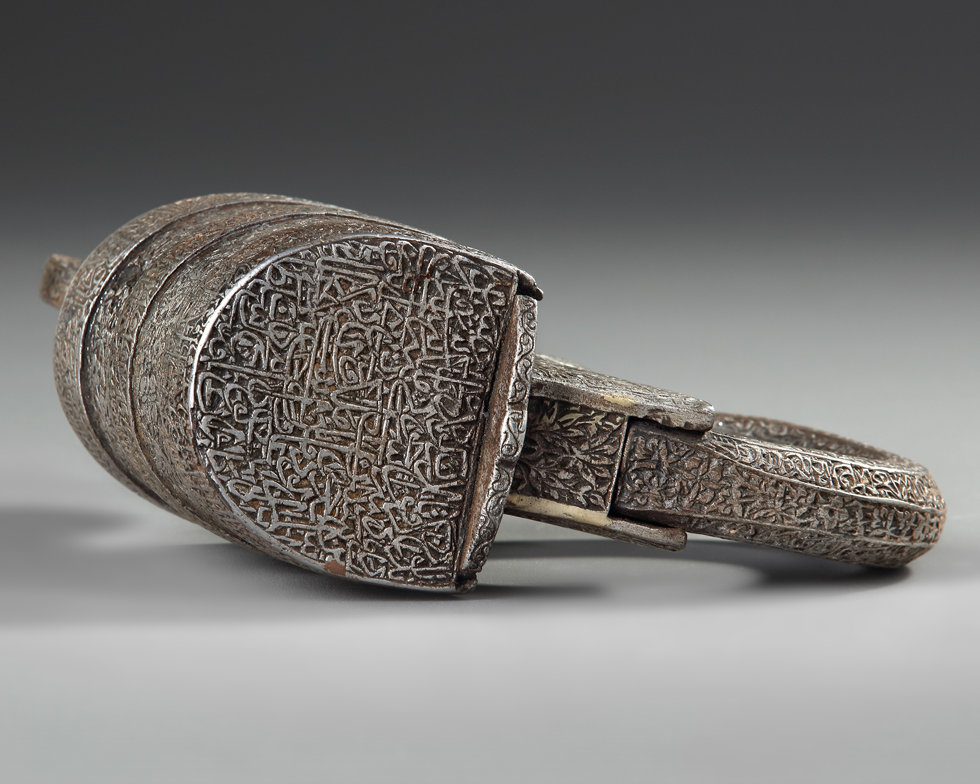 A SILVER INLAID METAL LOCK AND KEY, 20TH CENTURY