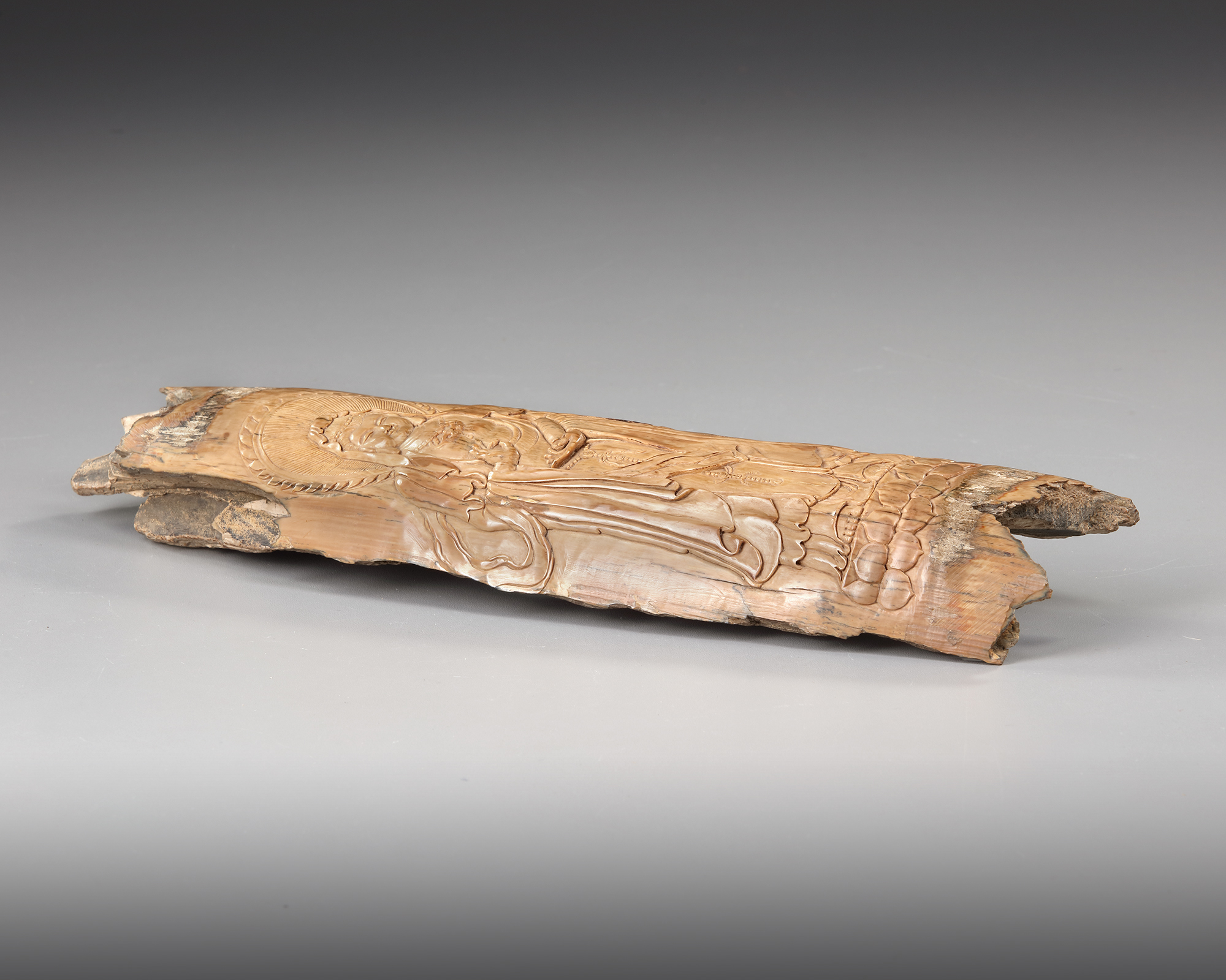 A CHINESE MAMMOTH IVORY CARVING, 19TH CENTURY