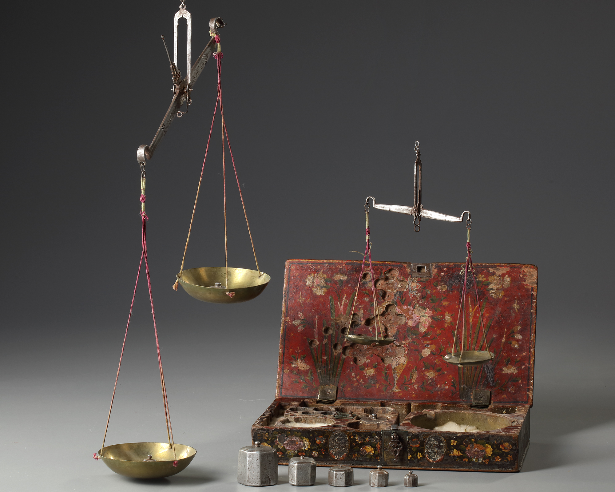 A QAJAR MINIATURE WOODEN WEIGHTS AND SCALES BOX, PERSIA, 19TH CENTURY