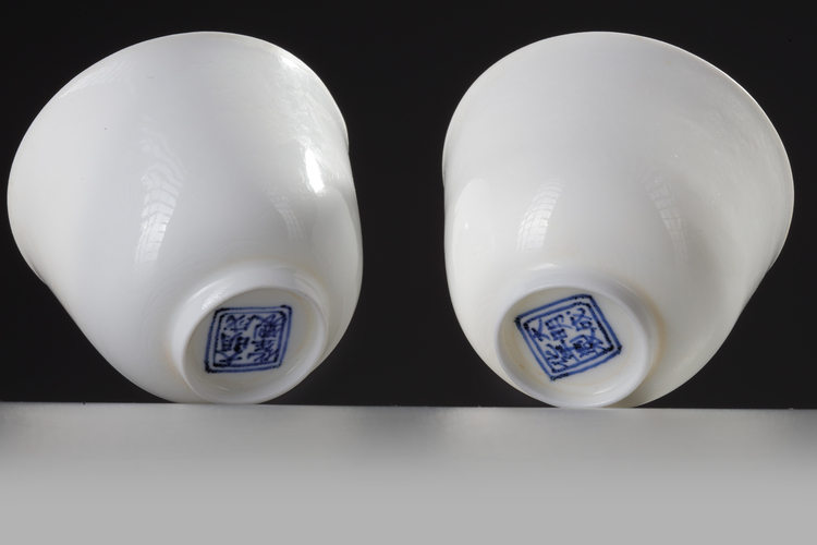 A PAIR OF SMALL CHINESE WHITE-GLAZED PHOENIX CUPS, 20TH CENTURY