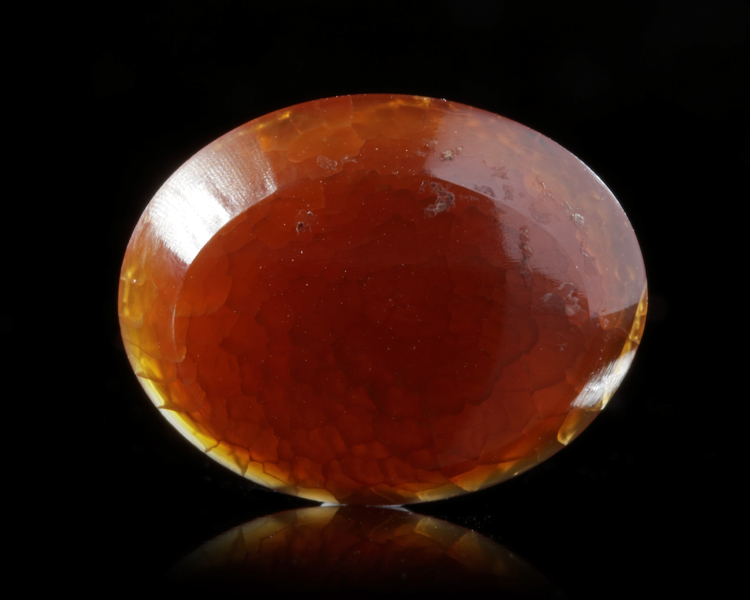 A ROMAN INTAGLIO SHOWING A BOY ON A DOLPHIN, ROMAN, 1ST CENTURY BC-AD