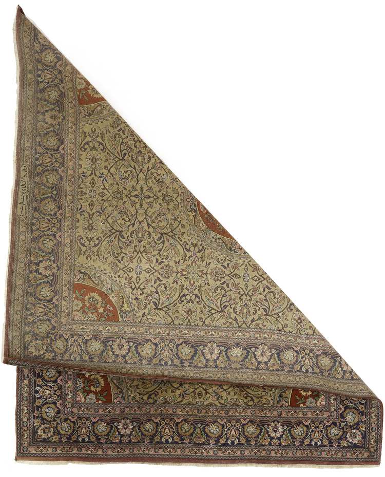 A VERY FINE PERSIAN SIGNED GHOM CARPET