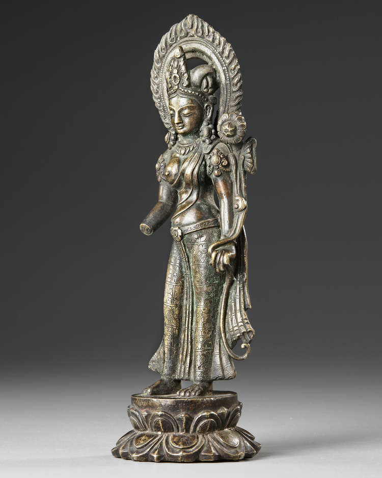 A NEPALESE BRONZE DANCING TARA, 19TH CENTURY