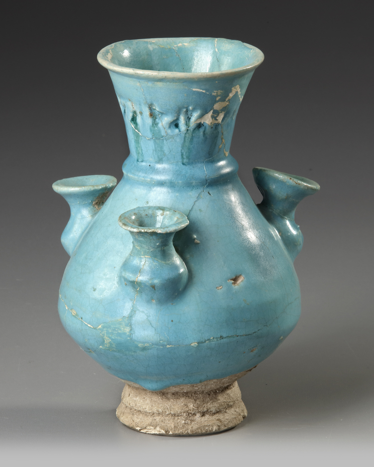 A KASHAN TURQUOISE GLAZED POTTERY VASE, PERSIA, 13TH CENTURY