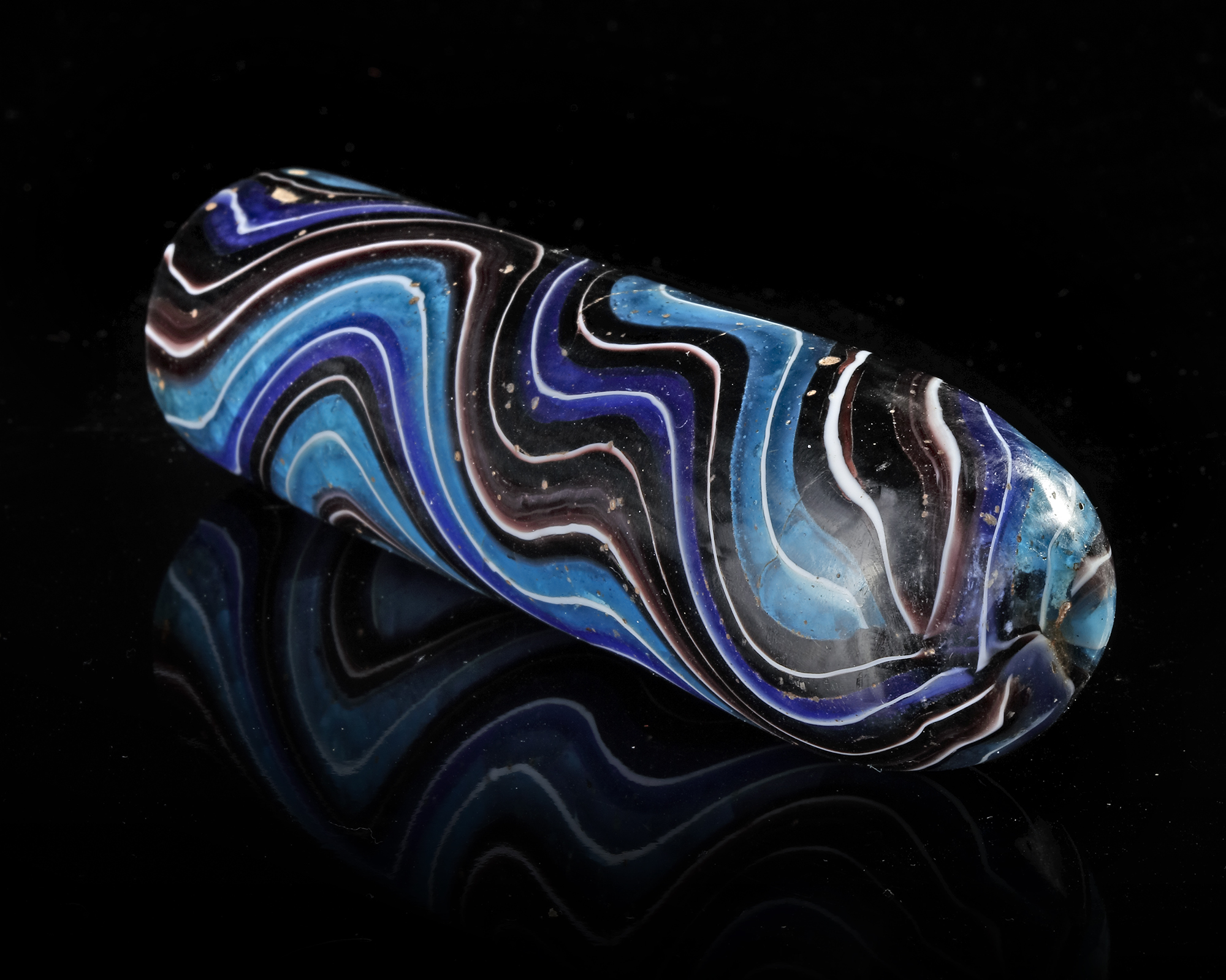 A CORE FORMED GLASS ALABASTRON, 1ST-2ND AD CENTURY