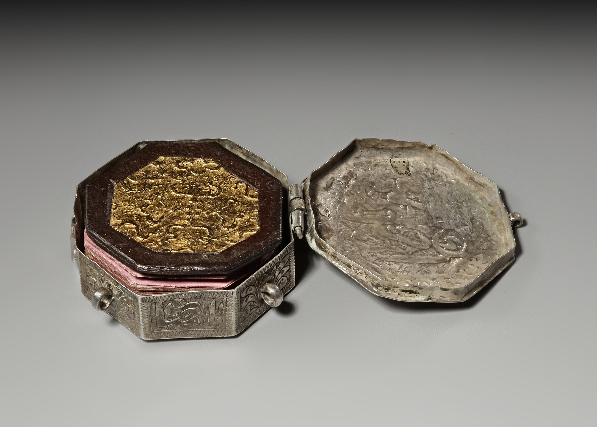 AN OTTOMAN ILLUMINATED MINIATURE OCTAGONAL DALA'IL AL-KHAYRAT COPIED BY ...