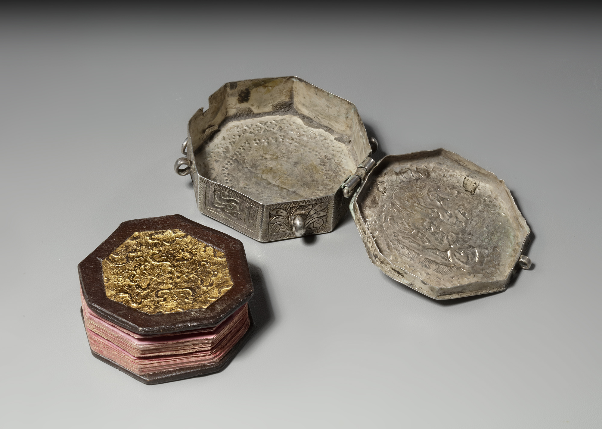 AN OTTOMAN ILLUMINATED MINIATURE OCTAGONAL DALA'IL AL-KHAYRAT COPIED BY ...