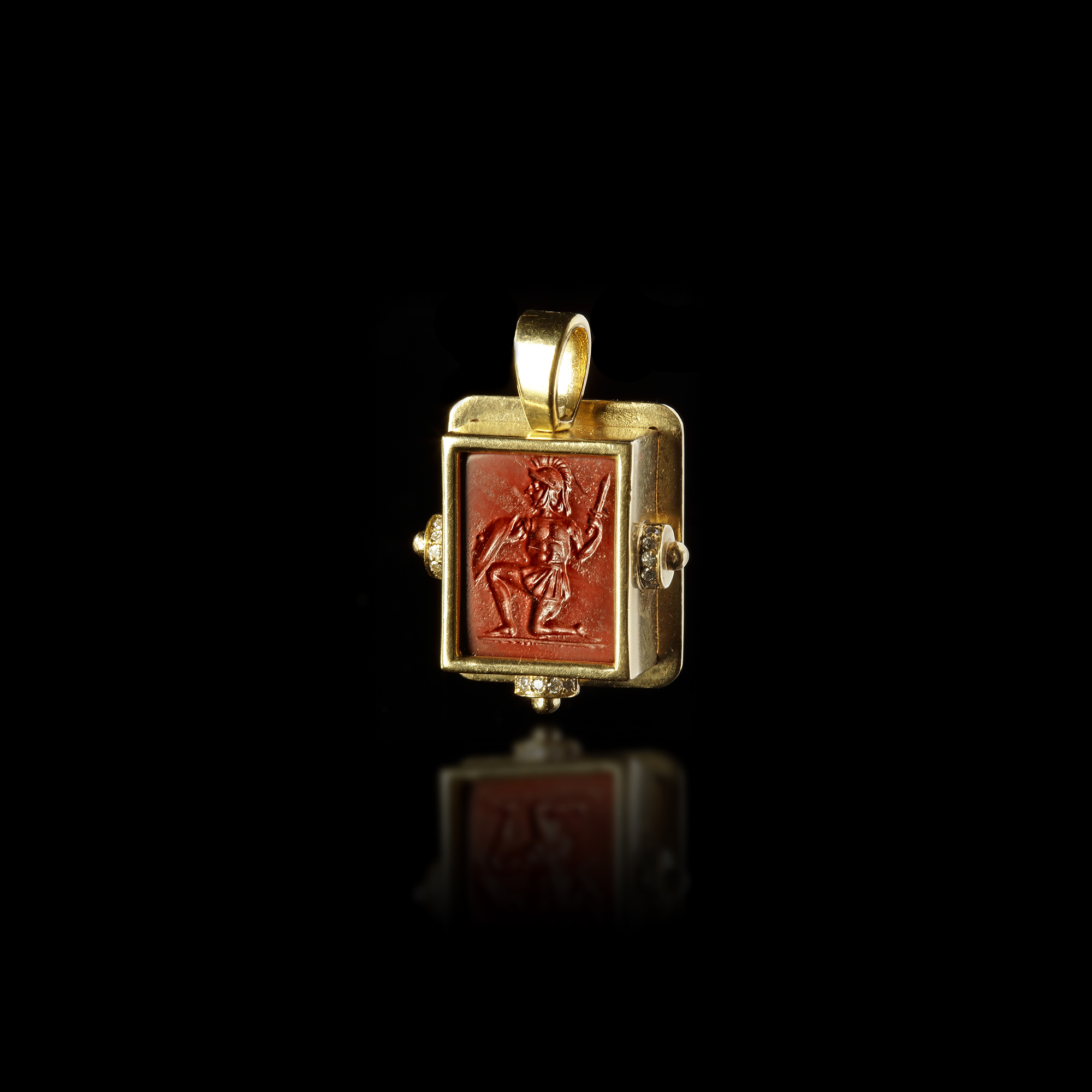 A ROMAN RED JASPER INTAGLIO IN A MODERN GOLD MOUNT, INTAGLIO 1ST-2ND ...