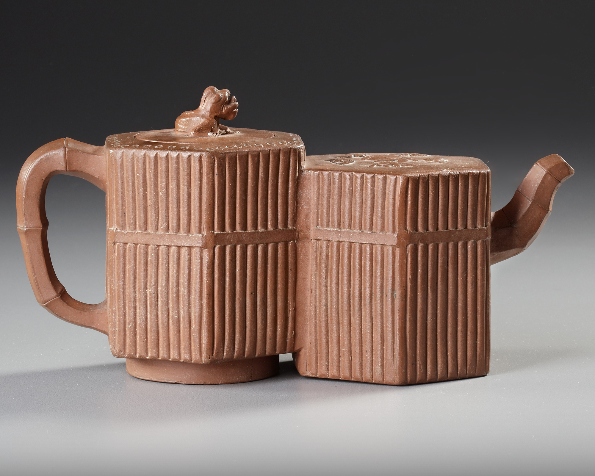 A CHINESE DOUBLE HEXAGONAL YIXING TEAPOT, 19TH CENTURY