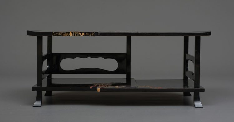 A JAPANESE LACQUER LOW TWO-TIERED DISPLAY TABLE, 1912-1926 (TAISHO PERIOD)