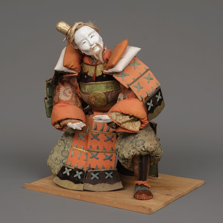 A LARGE JAPANESE HAND-CRAFTED WARRIOR DOLL, 18TH CENTURY