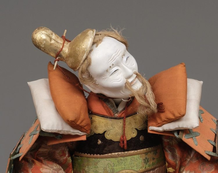 A LARGE JAPANESE HAND-CRAFTED WARRIOR DOLL, 18TH CENTURY