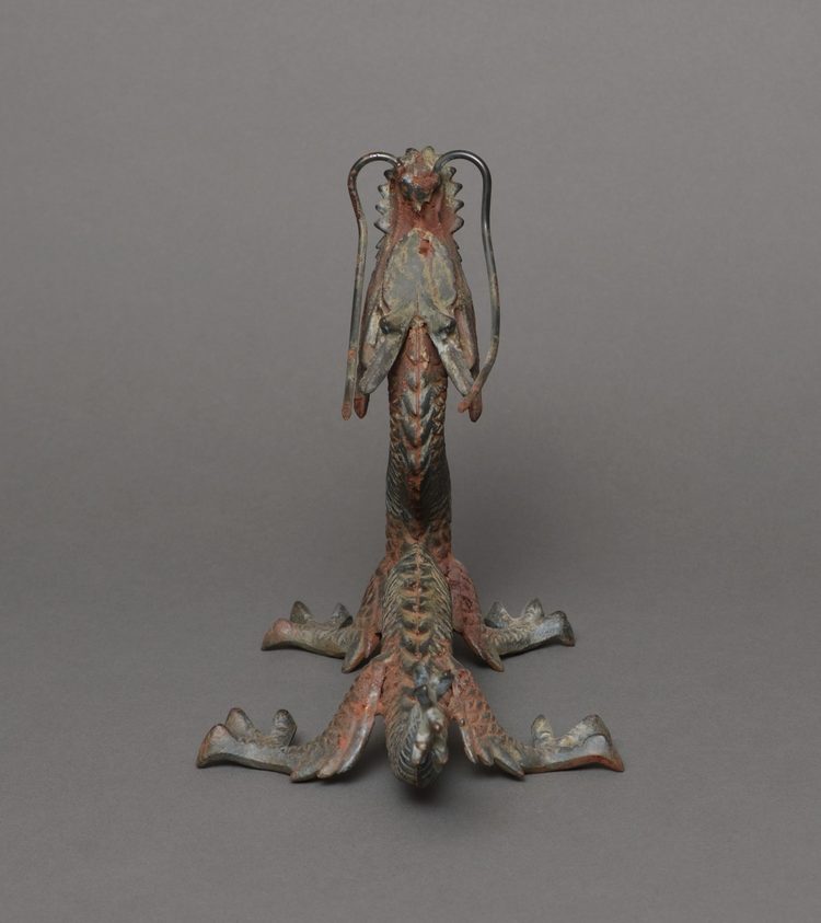A JAPANESE CAST-IRON OKIMONO DRAGON, MID 20TH CENTURY