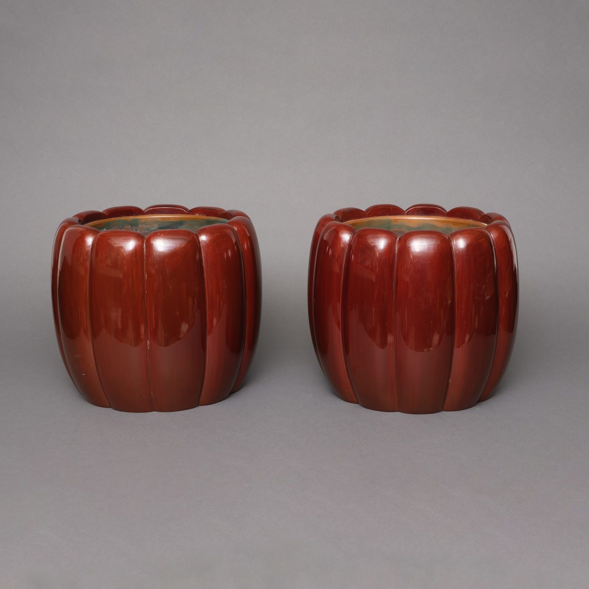 A PAIR OF RED LACQUERED JAPANESE HIBACHI, EARLY SHOWA PERIOD