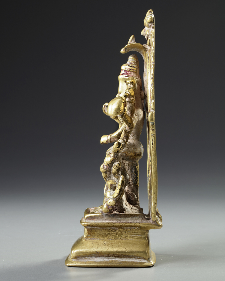 AN INDIAN GILT BRONZE SIX-ARMED DURGA MAHISASURA MARDINI, 19TH CENTURY