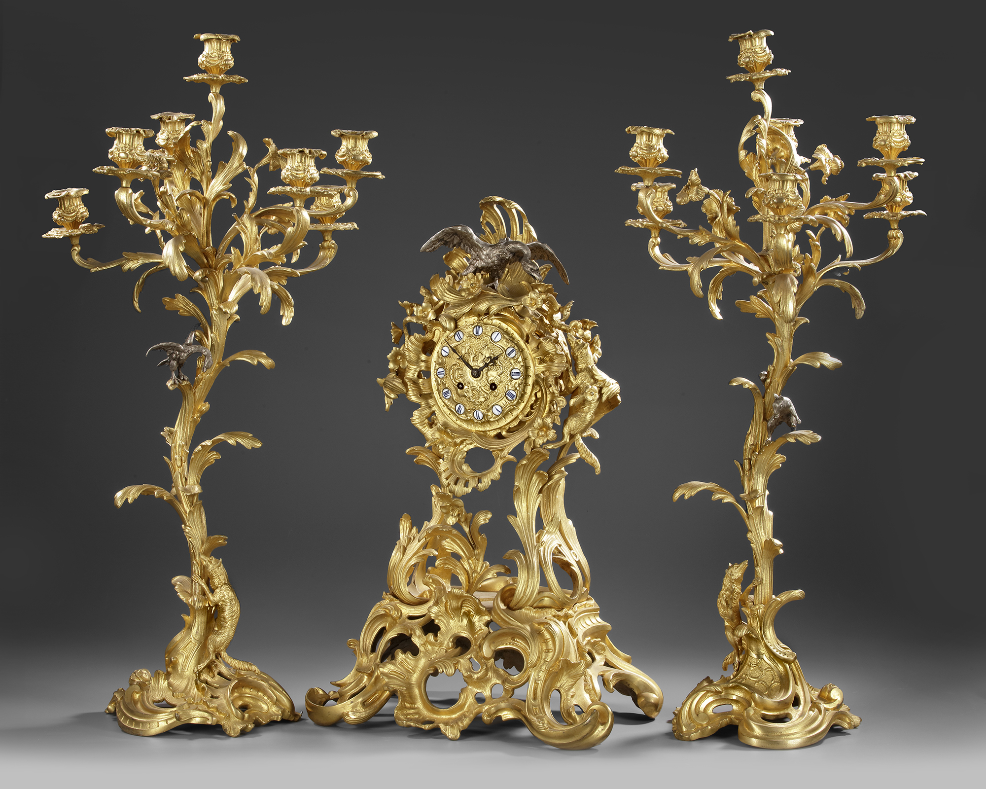 A CLOCK SET, LOUIS XV STYLE, 19TH CENTURY