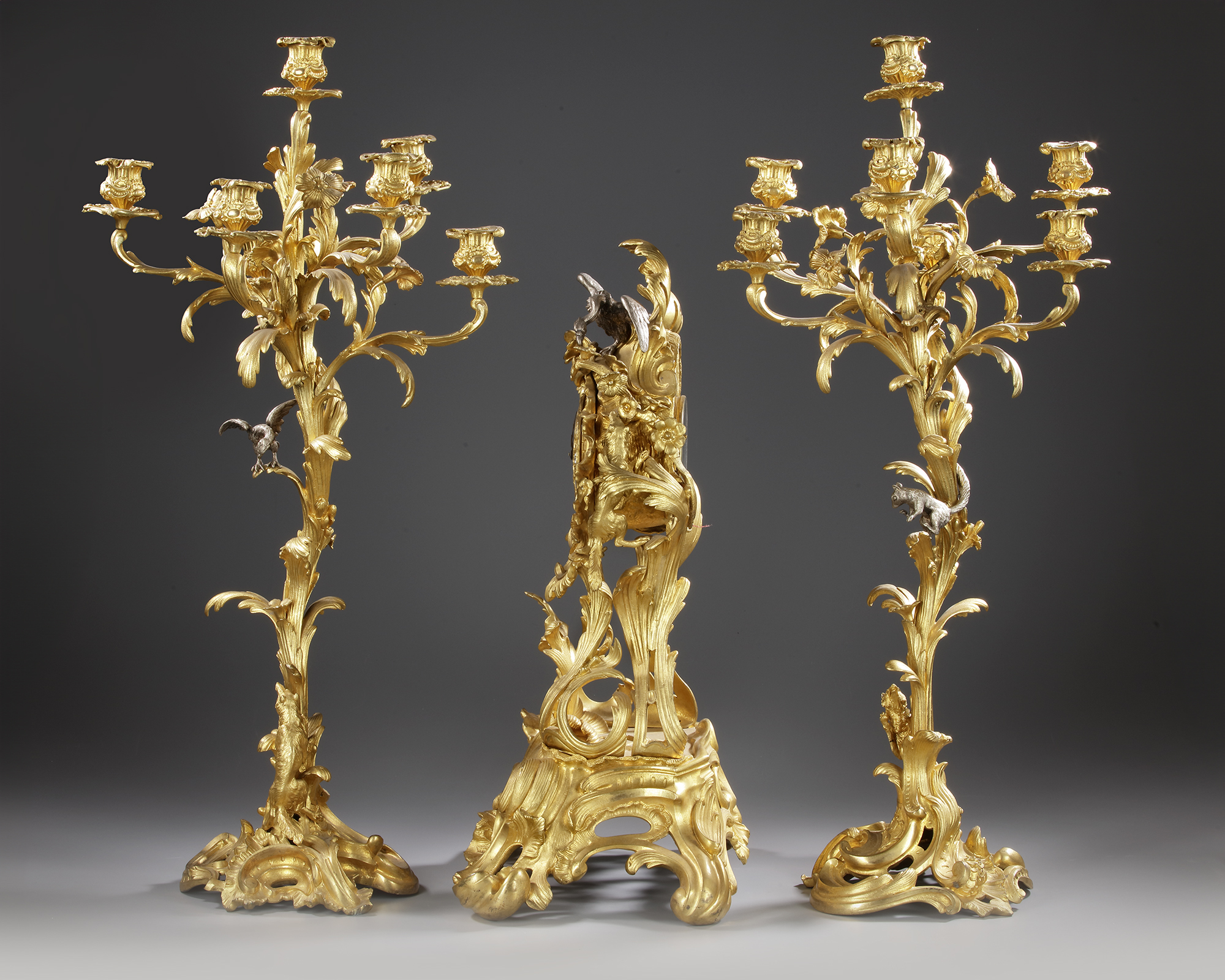 A CLOCK SET, LOUIS XV STYLE, 19TH CENTURY