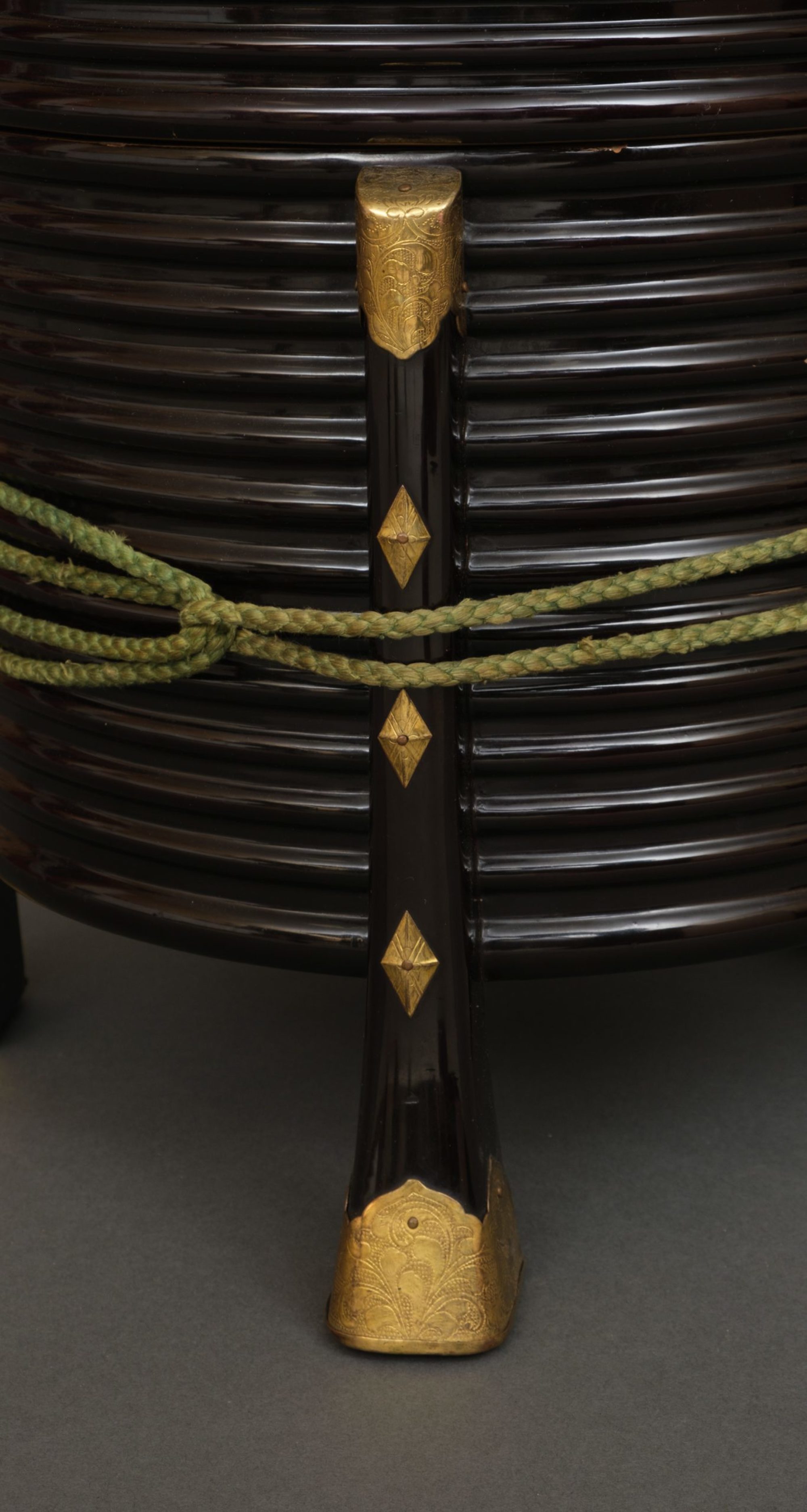 A LACQUERED HOKAI WITH GOLD BUTTERFLY CREST