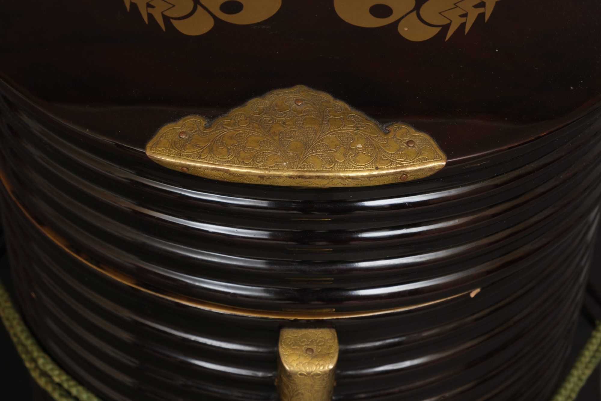 A LACQUERED HOKAI WITH GOLD BUTTERFLY CREST