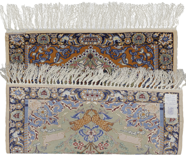 A SMALL FINE ISFAHAN RUG