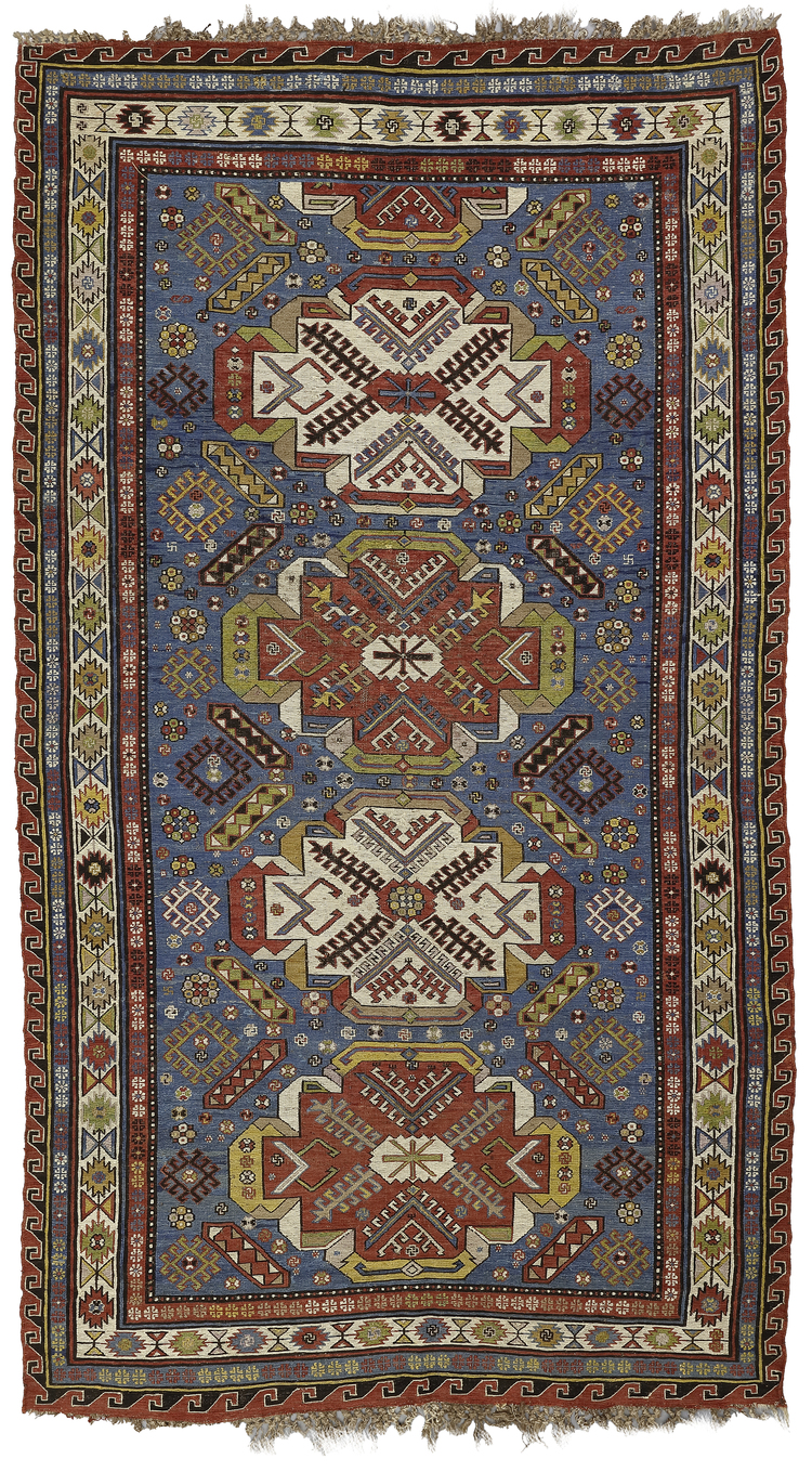 AN ANTIQUE CAUCASIAN SUMAK CARPET