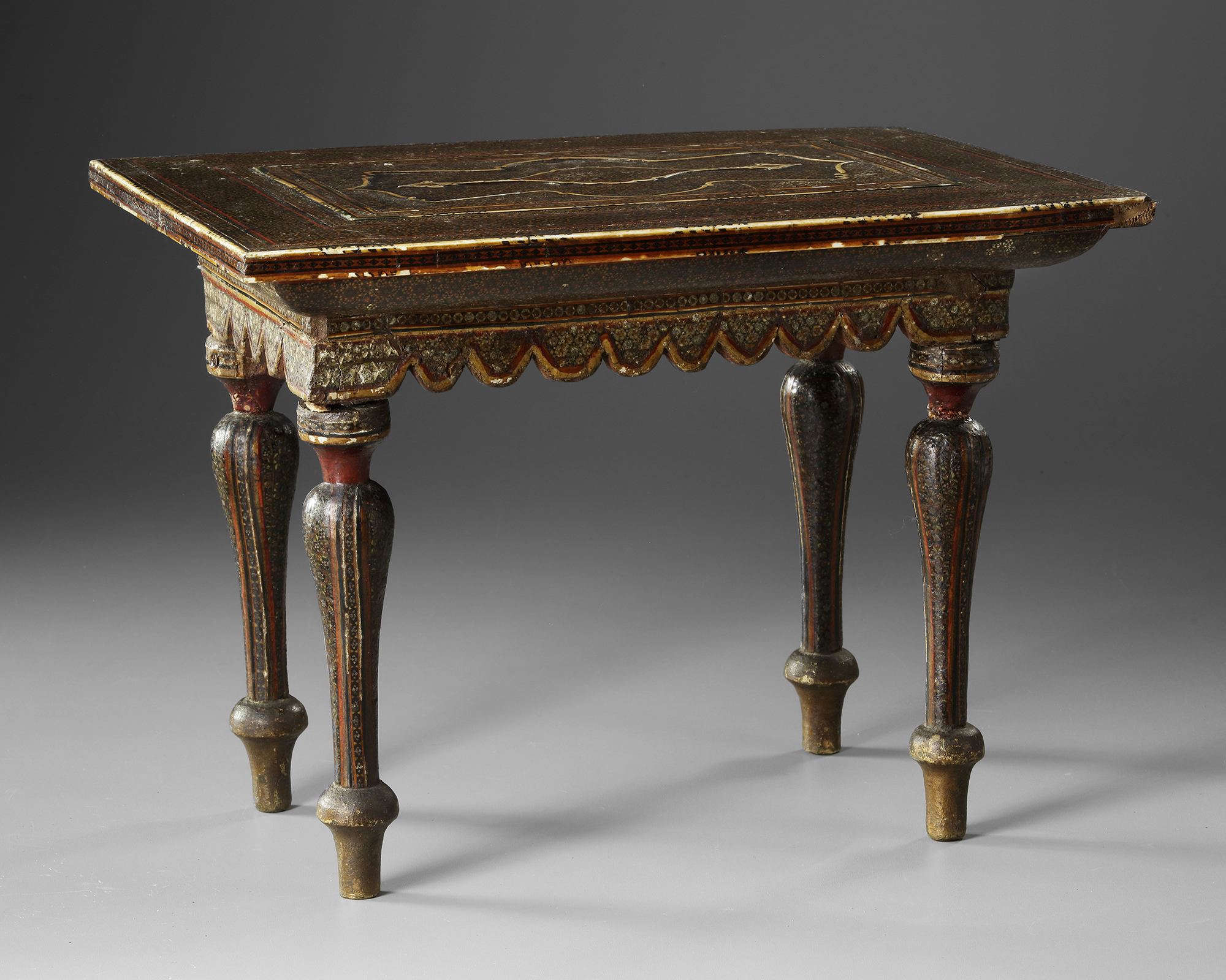 A QAJAR LACQUERED WOODEN TABLE, 19TH CENTURY