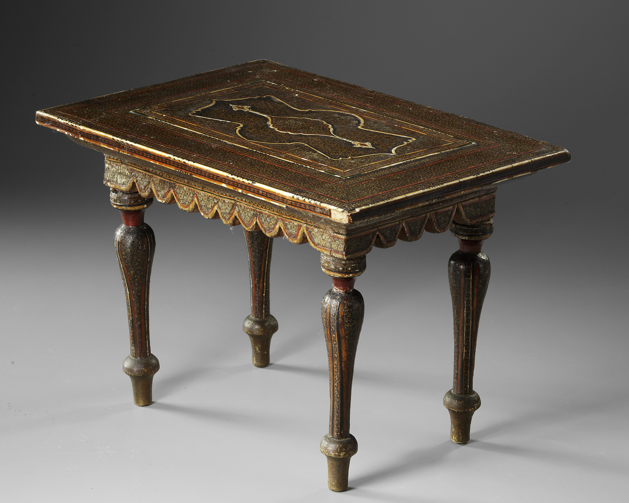 A QAJAR LACQUERED WOODEN TABLE, 19TH CENTURY