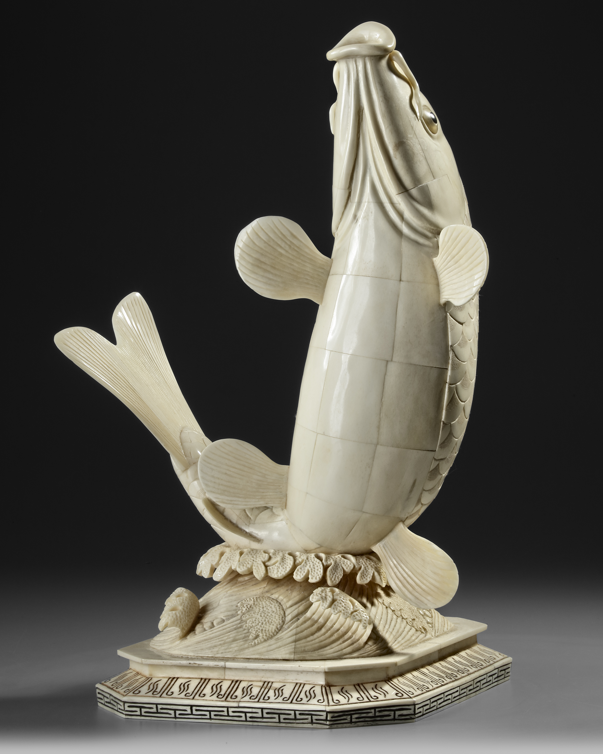 LARGE JAPANESE SCULPTURE — JUMPING KOI FISH IN CARVED BONE, 20TH CENTURY