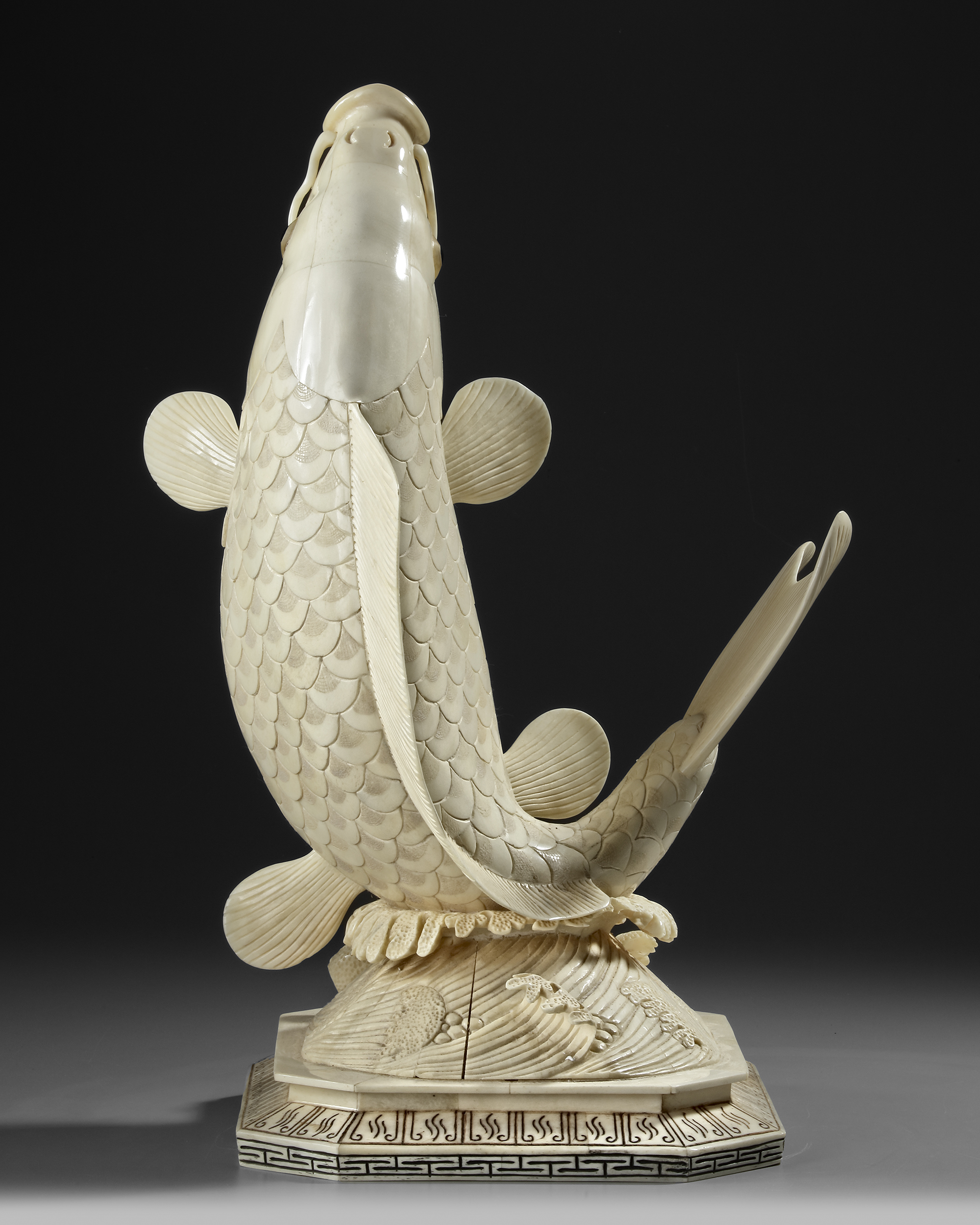 LARGE JAPANESE SCULPTURE — JUMPING KOI FISH IN CARVED BONE, 20TH CENTURY