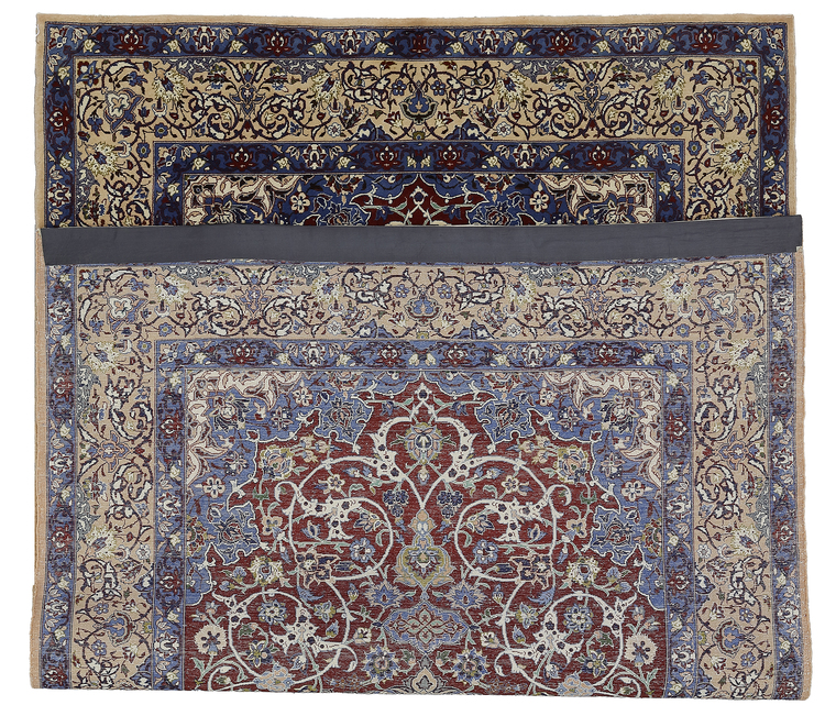 A FINE ISFAHAN RUG WITH SILK