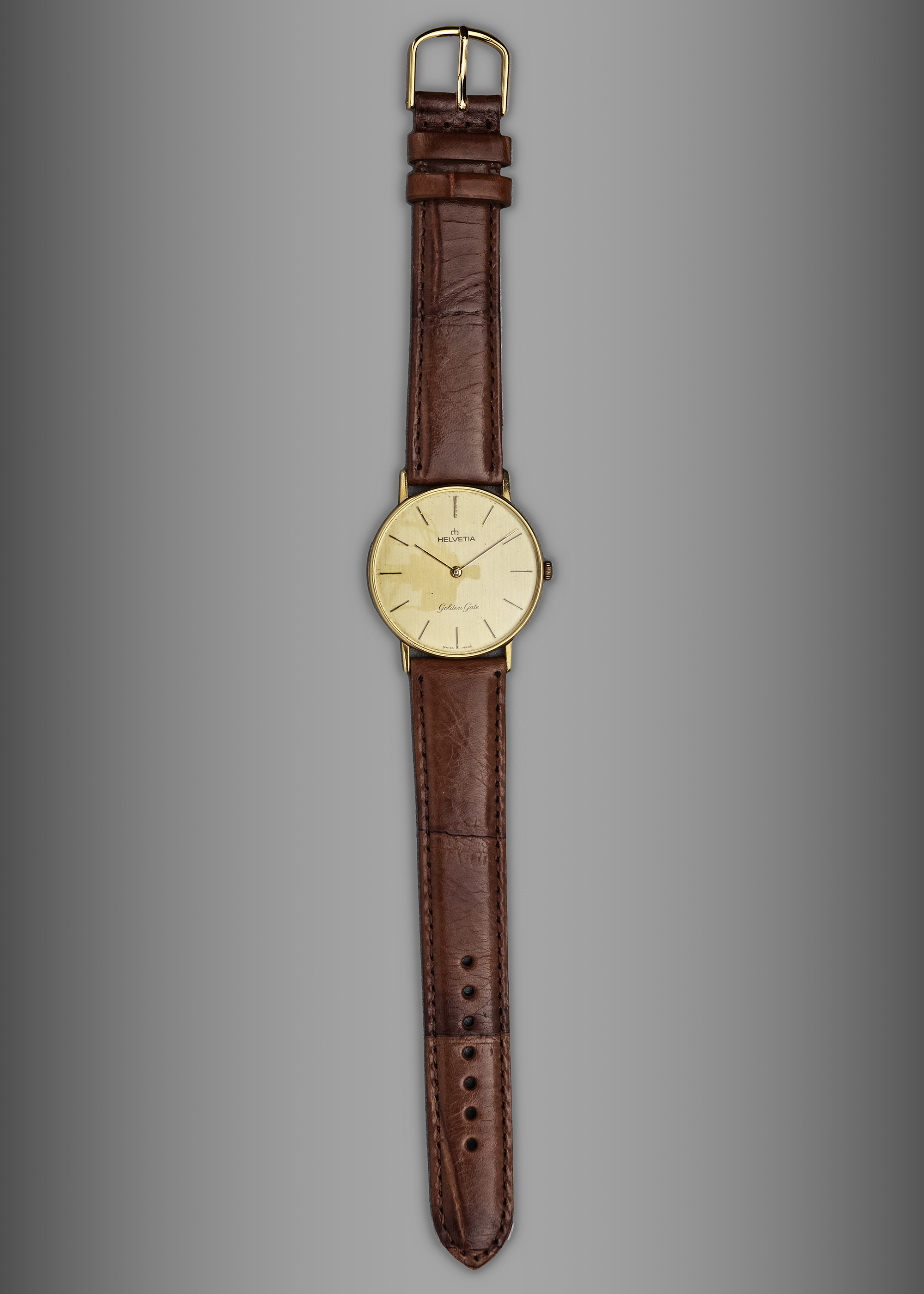 A 18 CARAT GOLD 'HELVETIA' WATCH