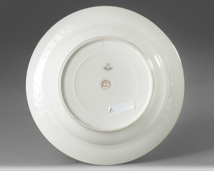 A SÈVRES DINNER PLATE WITH THE ROYAL MONOGRAM OF QUEEN JULIANA AND ...
