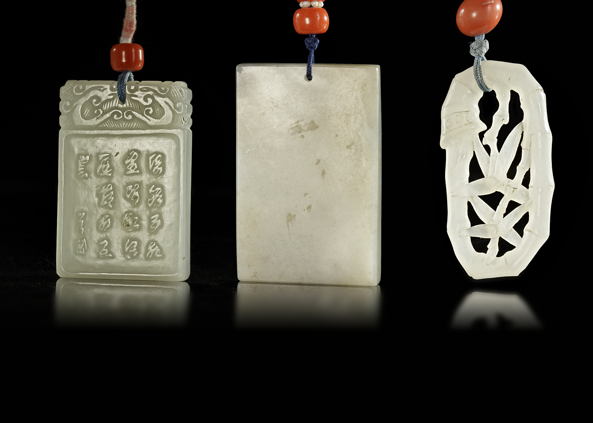 THREE CHINESE JADE CARVED PENDANTS