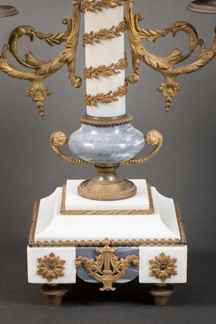 A FRENCH GREY AND WHITE MARBLE TRIM