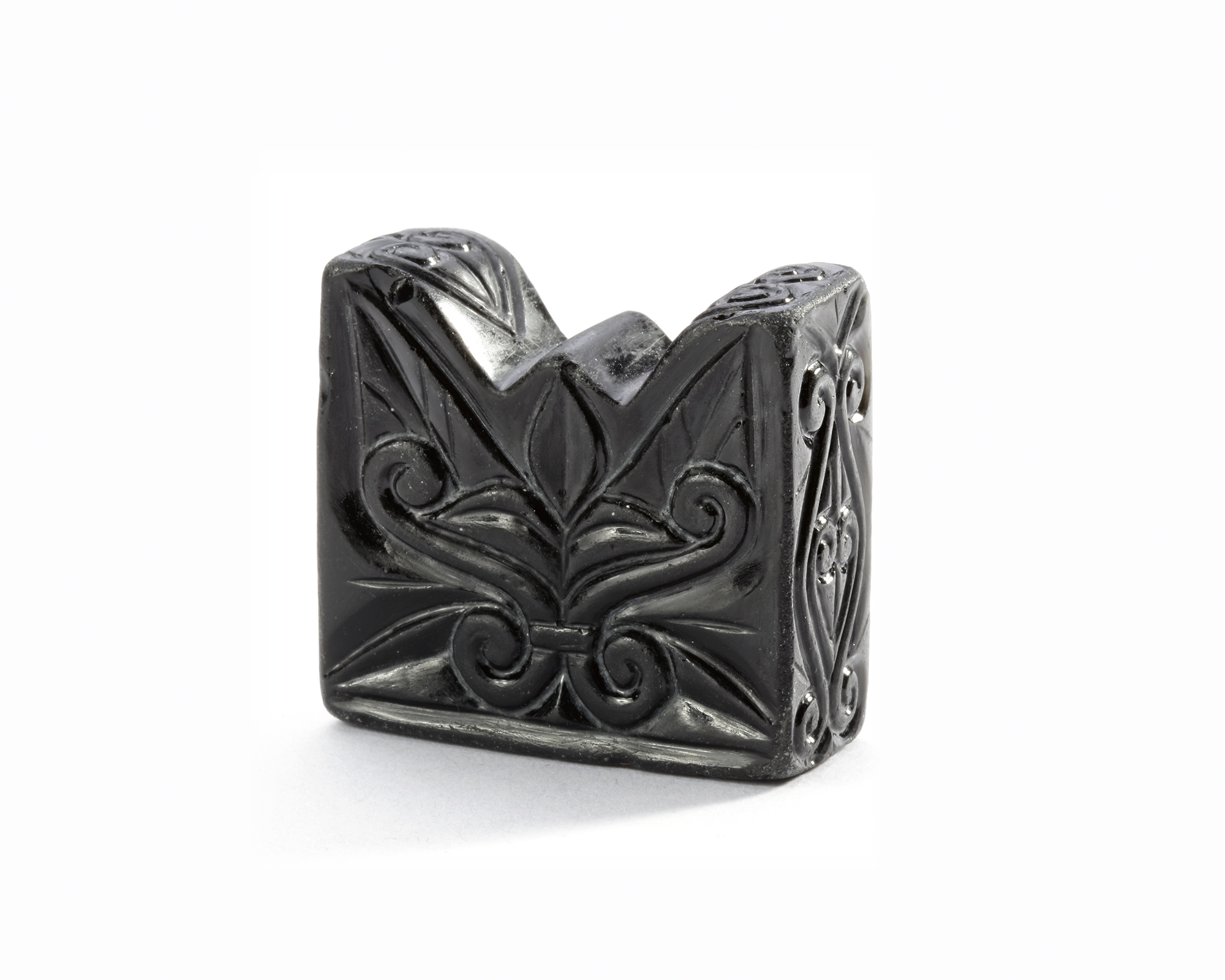 A CARVED OBSIDIAN CHESS PIECE, POSSIBLY,10TH-11TH CENTURY